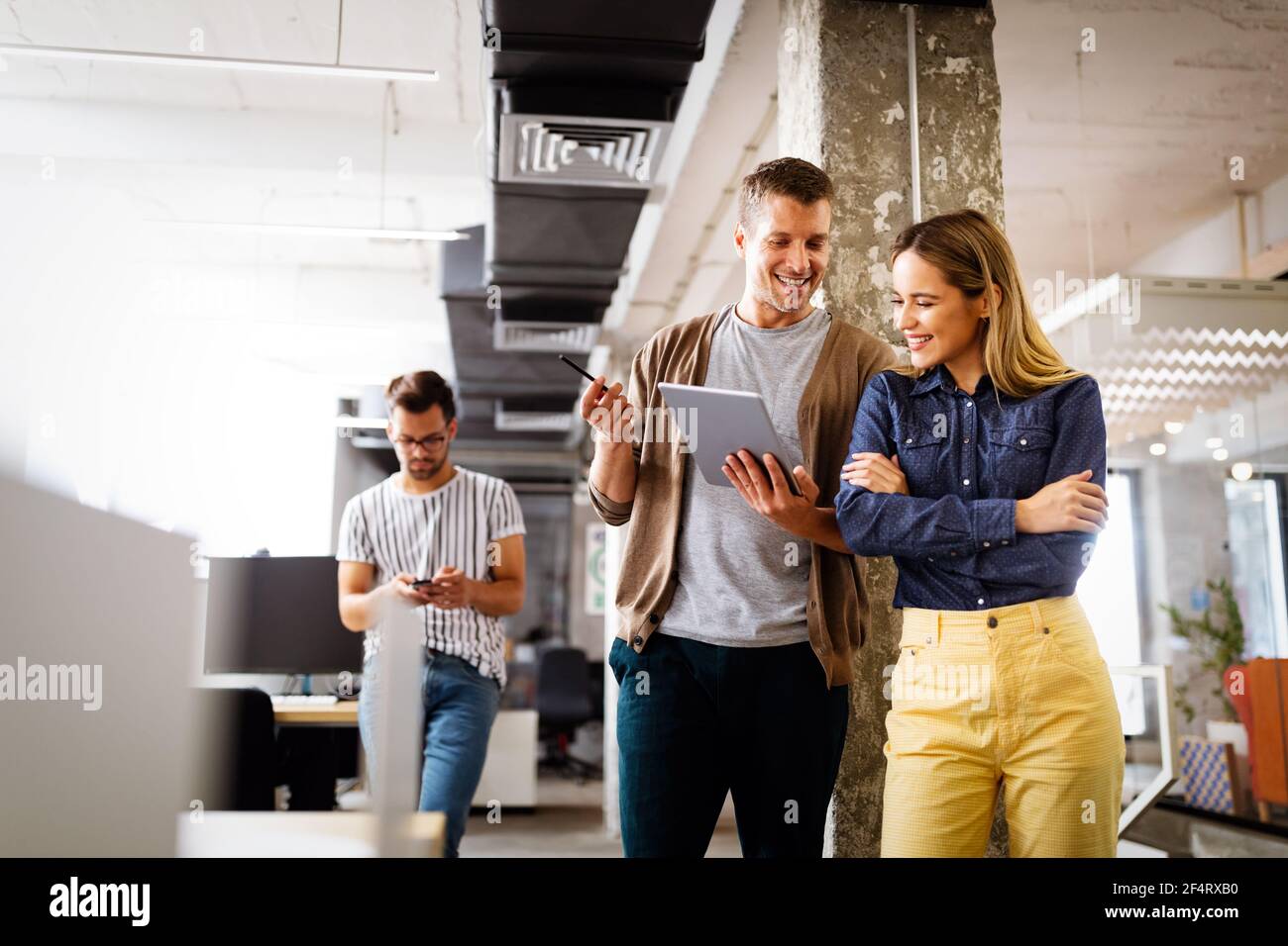 Happy creative team in office. Business, startup, design, people and ...