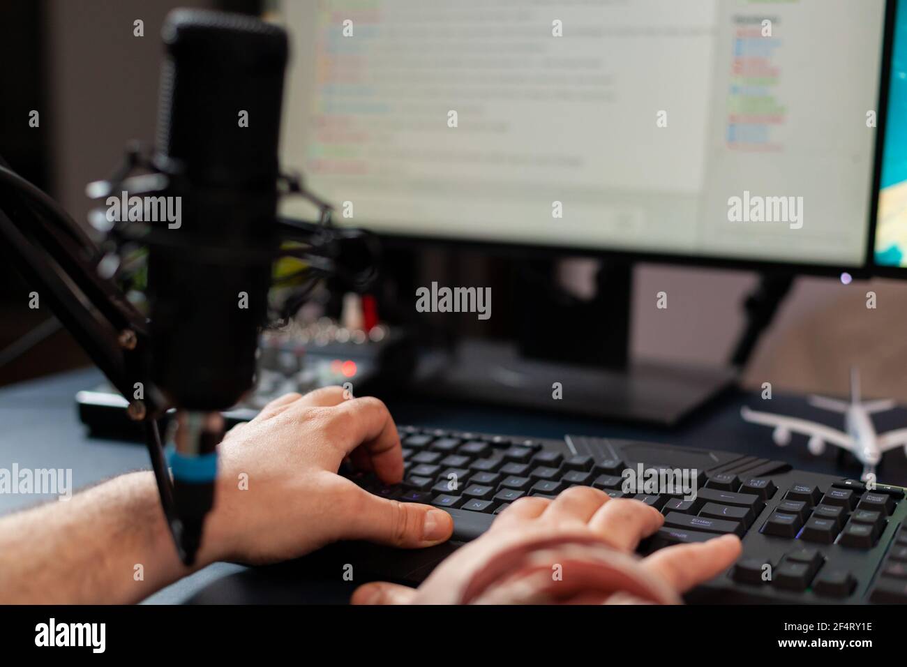 Close up of professional keyboard with RGB lighting during streaming ...