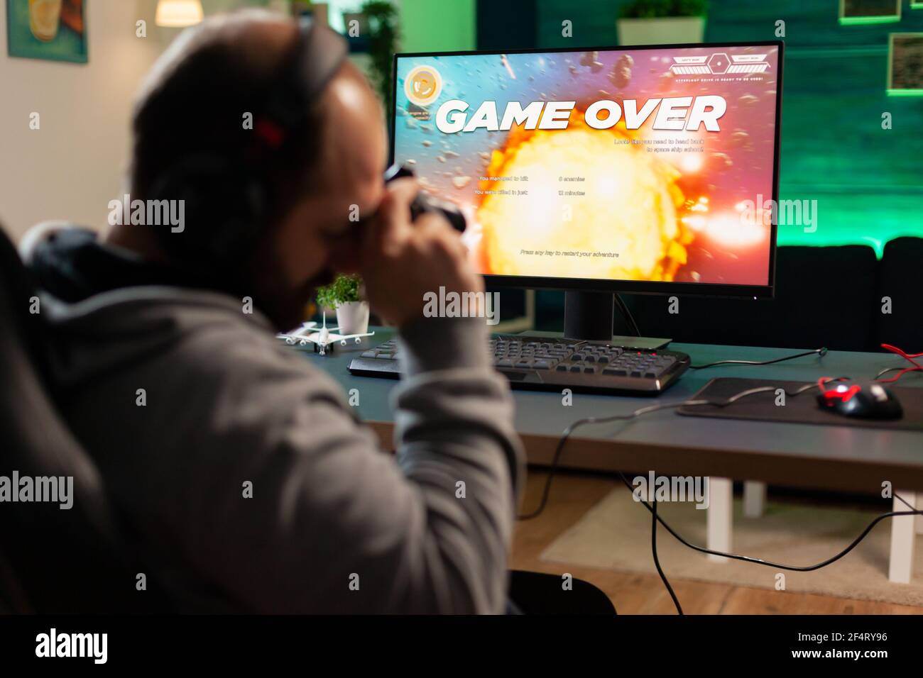 Competitive player losing e-sport championship using technology network ...