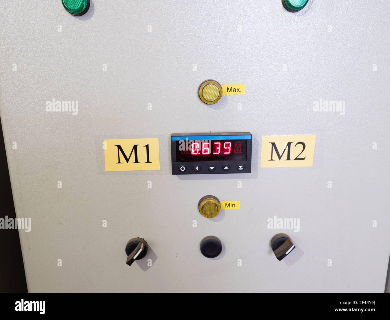 Information deck. Analog switches, lights and a display show the status ...