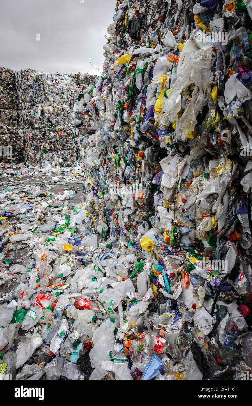 Bales of plastic waste at a materials recycling facility in the UK ...