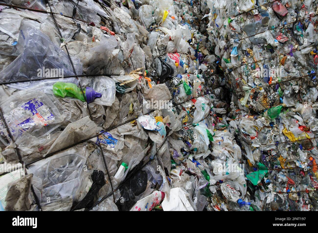 Bales of plastic waste at a materials recycling facility in the UK ...
