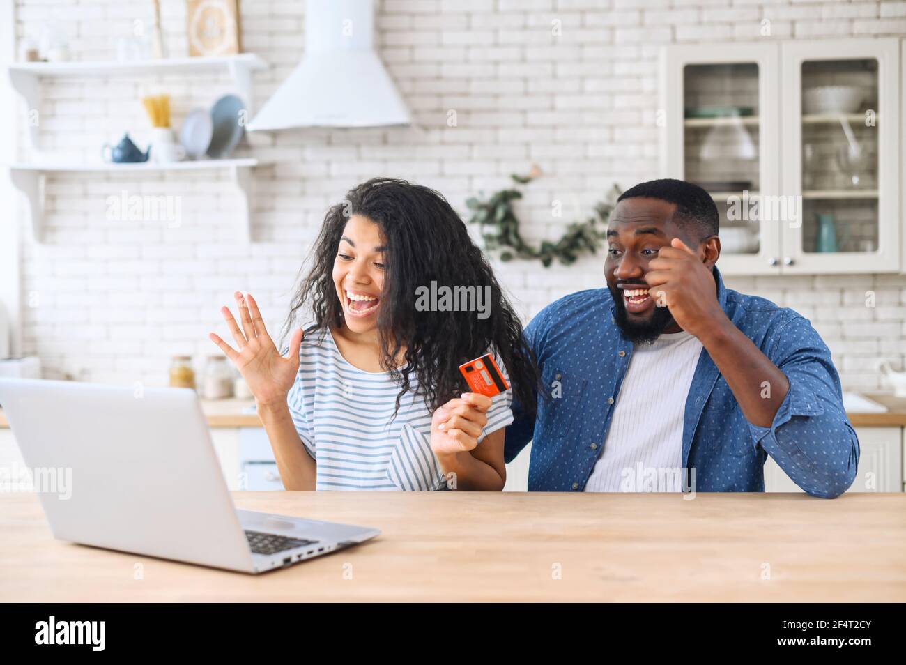 Overjoyed young multiracial couple hi-res stock photography and images ...