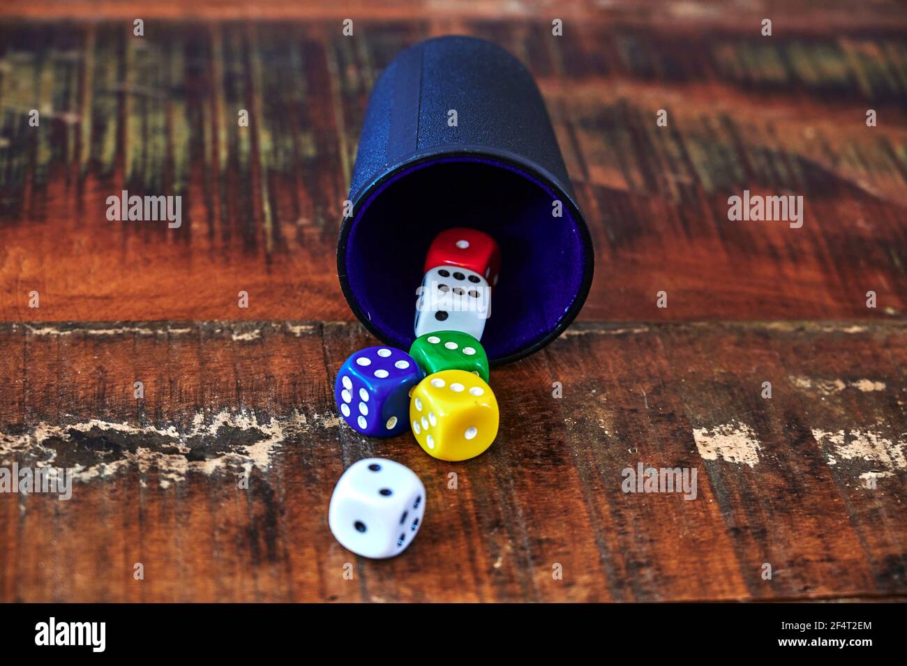 Different colored dice hi-res stock photography and images - Alamy