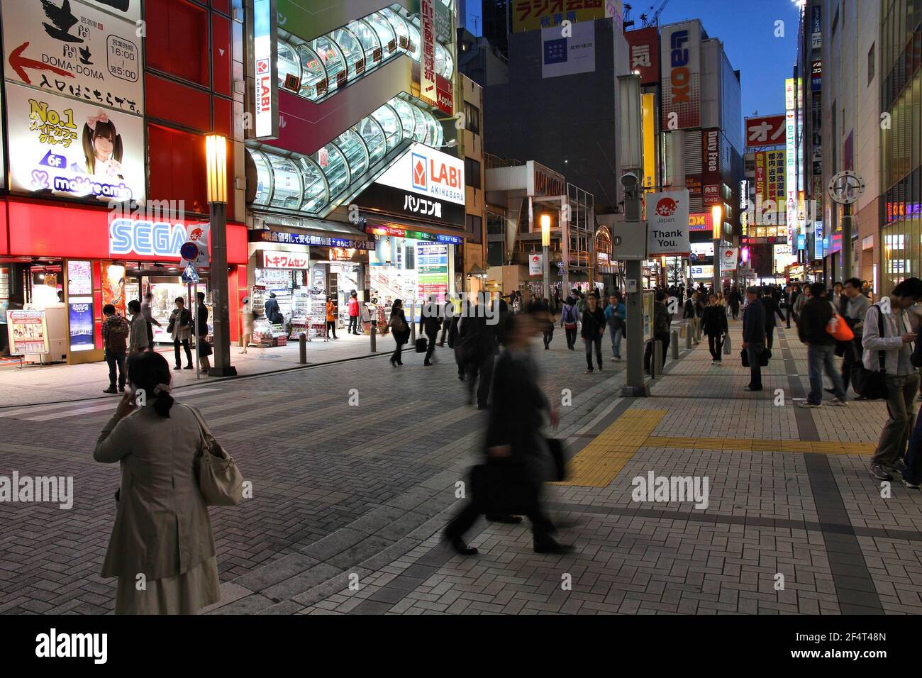 TOKYO, JAPAN - APRIL 12, 2012: People visit Akihabara Electric Town ...
