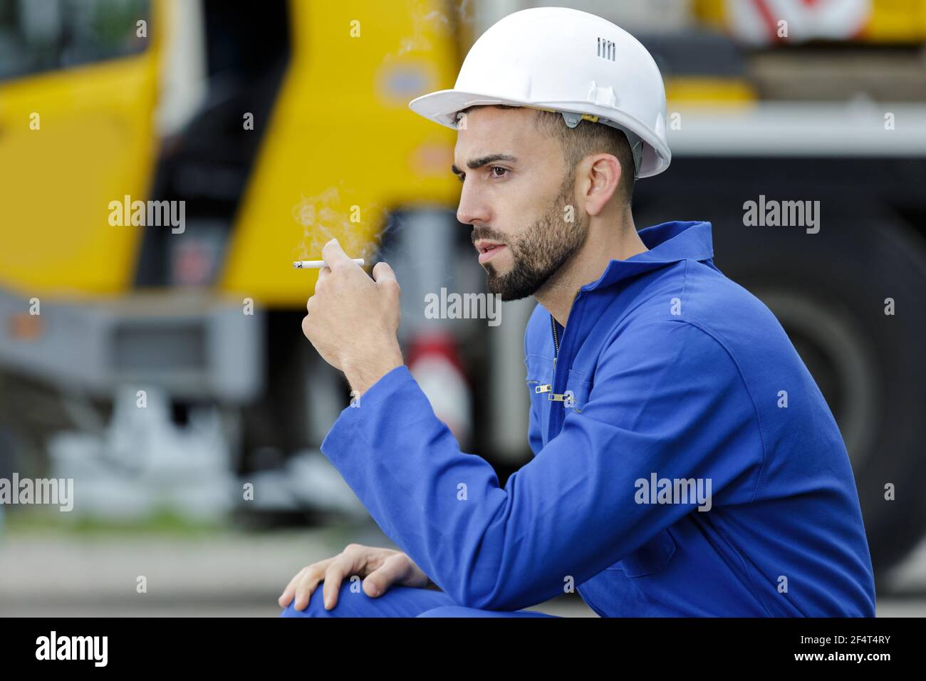 construction worker smoking Stock Photo - Alamy