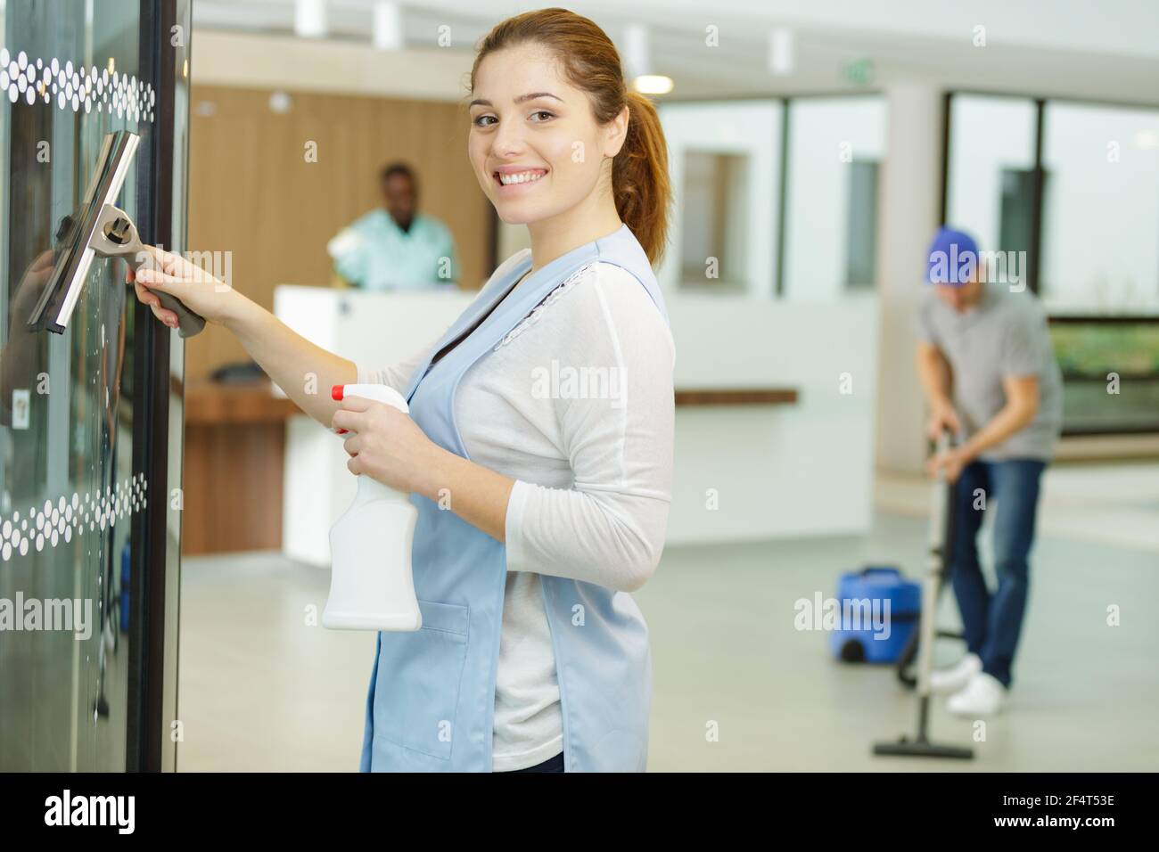 happy cleaner maid woman in hospital Stock Photo - Alamy