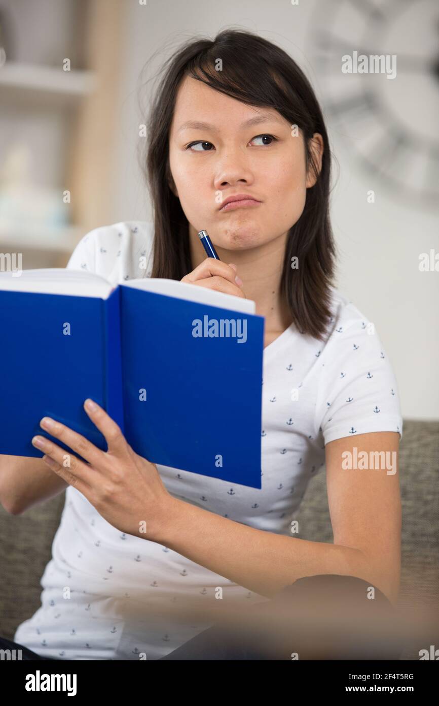 female student with a book Stock Photo - Alamy