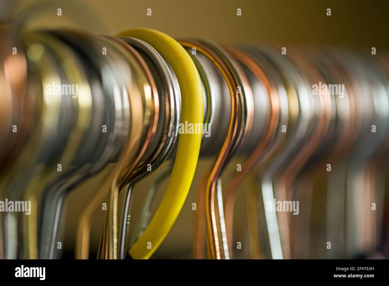 Coat hangers line hi-res stock photography and images - Alamy