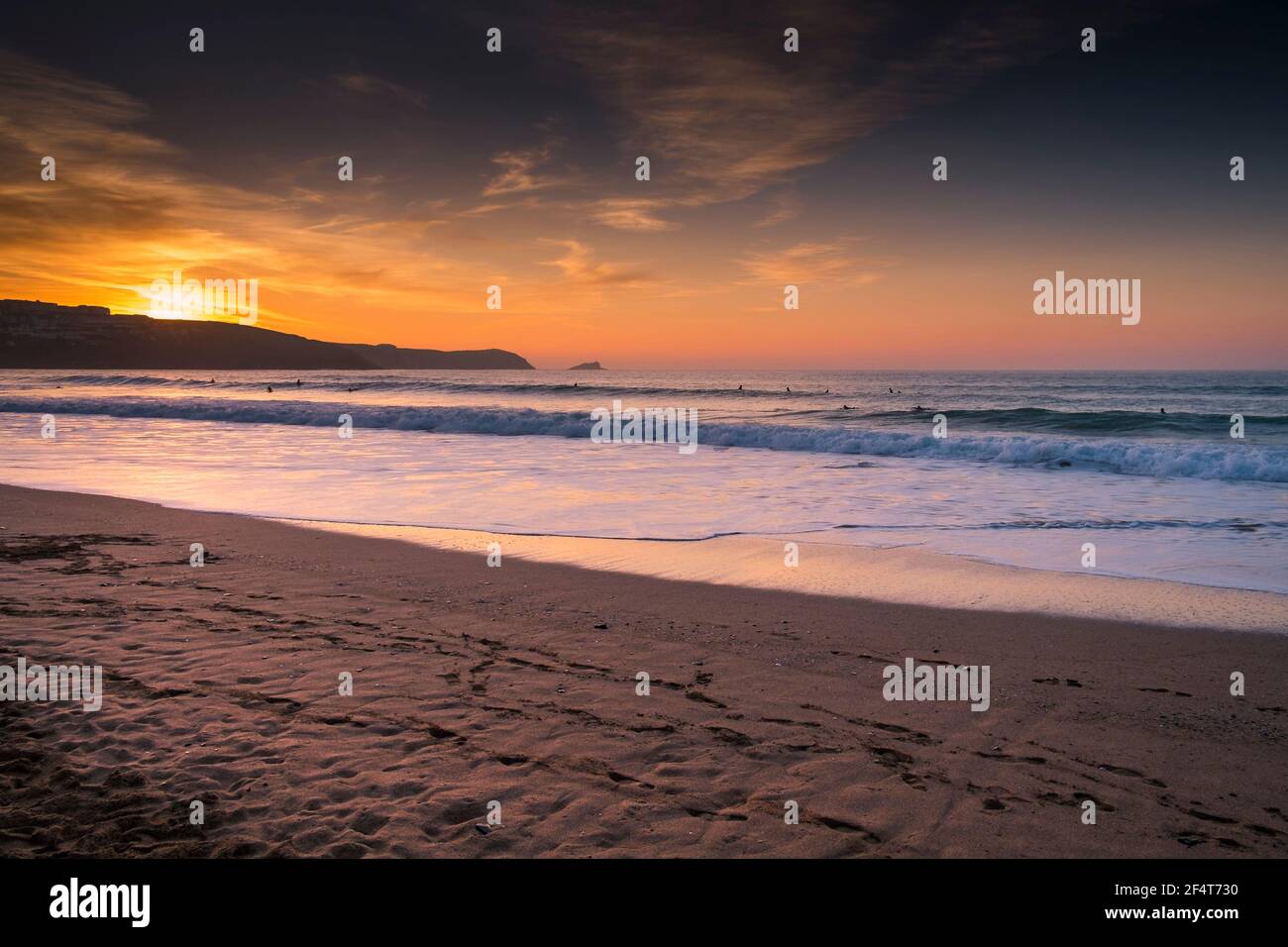 A golden sunset over Fistral Beach in Newquay in Cornwall Stock Photo ...