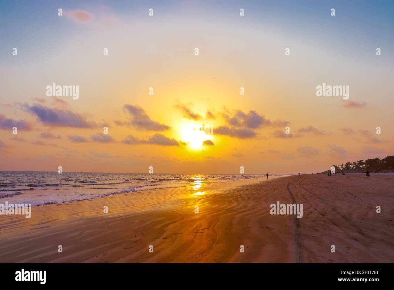 sunset landscape photo of Kuakata sea beach . evening sky reflected on ...