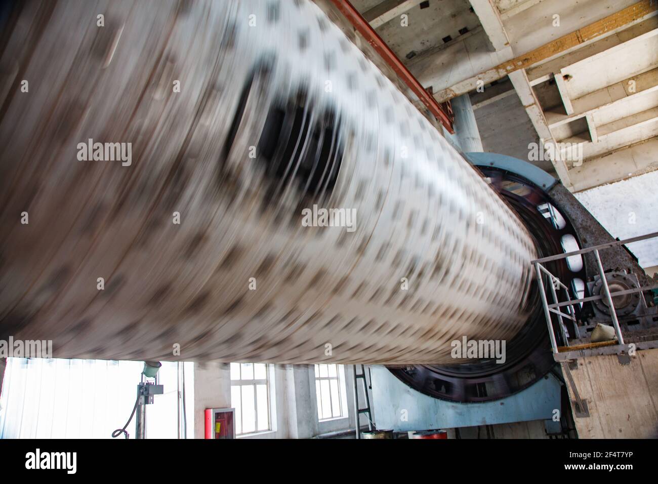 Standard Cement plant. Rotating factory ball mill (dressing mill ...