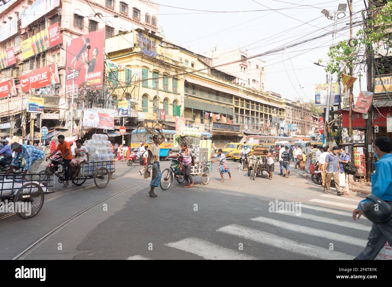 Crowded city street of Bara Bazar, a lively shopping district of ...