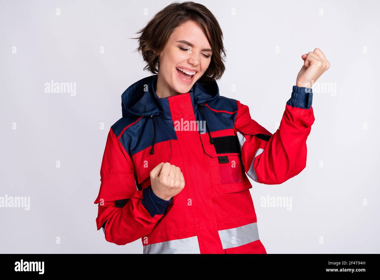 Photo of happy crazy excited cheerful woman paramedic raise fists in ...