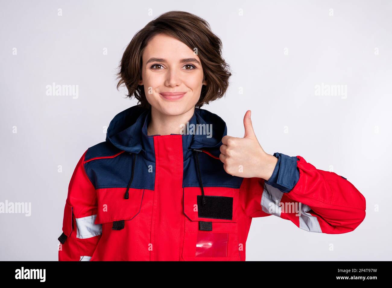 Photo of happy lovely beautiful charming pretty girl paramedic showing ...