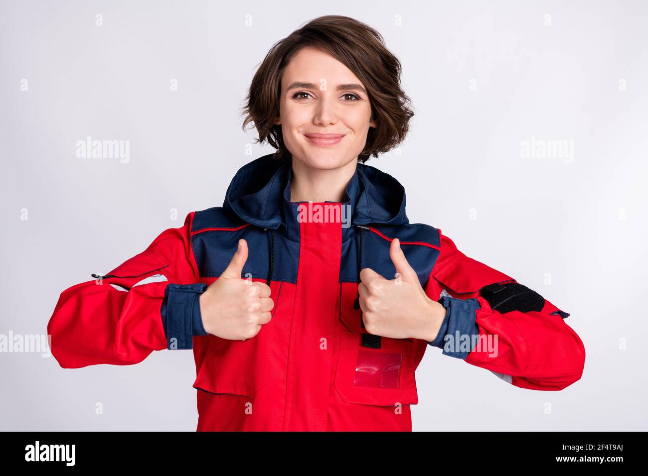 Photo Of Optimistic Nice Brunette Lady Show Thumb Up Wear Uniform