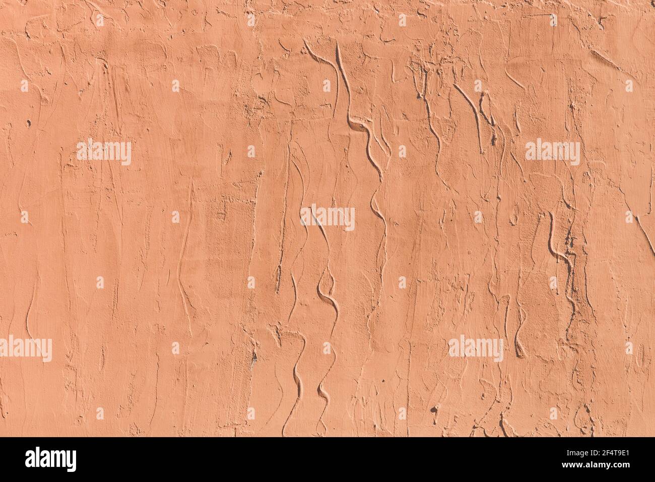 Light brown plaster wall with abstract stucco pattern texture ...