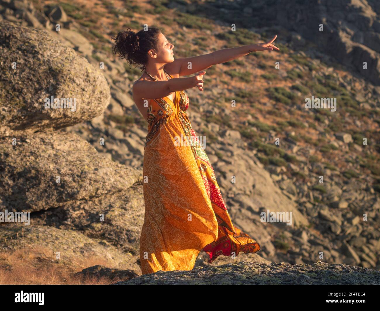 Dancing orange flower hi-res stock photography and images - Alamy