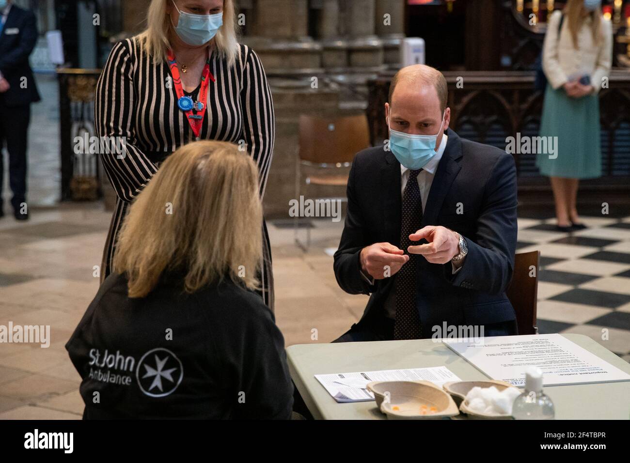 The Duke of Cambridge speaks to a St John Ambulance volunteer with ...