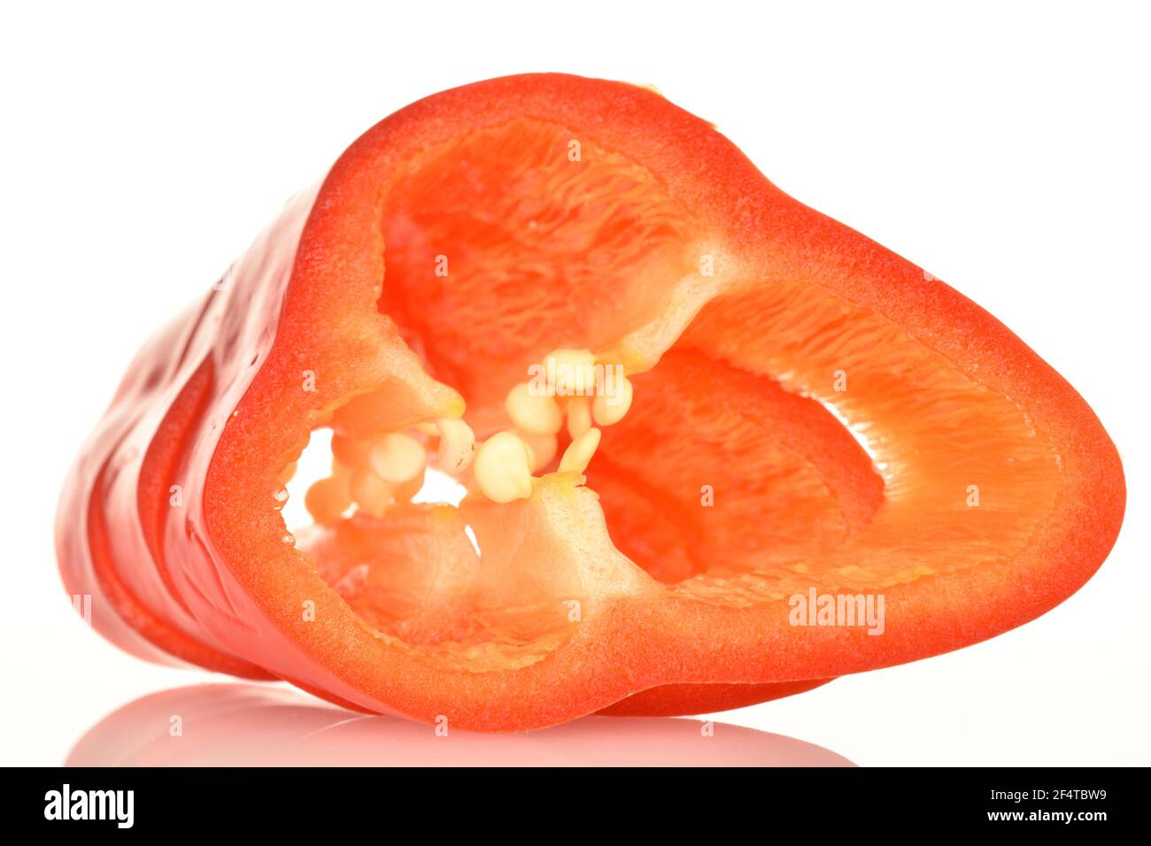 Several ripe bright red juicy tasty organic Kapia pepper pods, on a ...