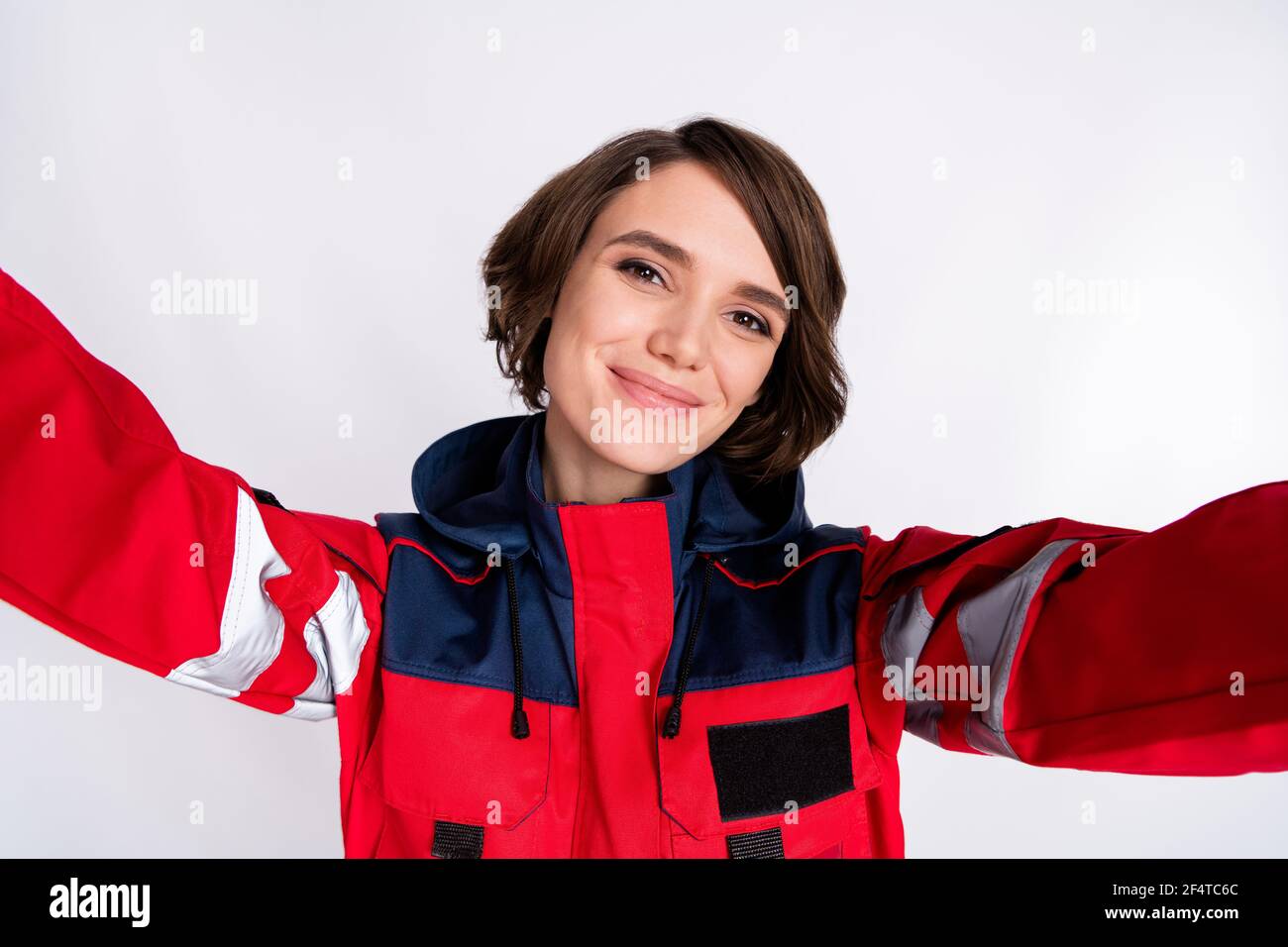 Photo of optimistic nice brunette lady do selfie wear uniform isolated ...