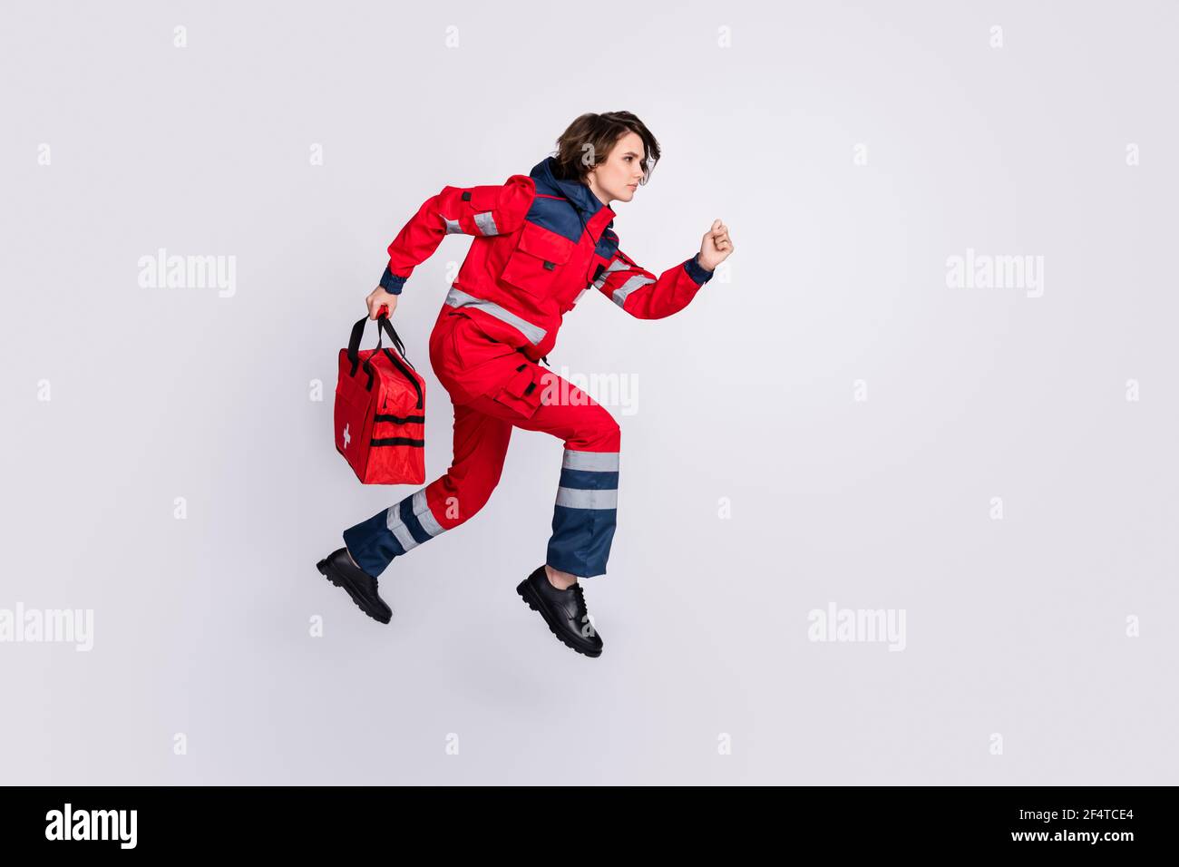 Full size profile side photo of serious woman paramedic running first ...