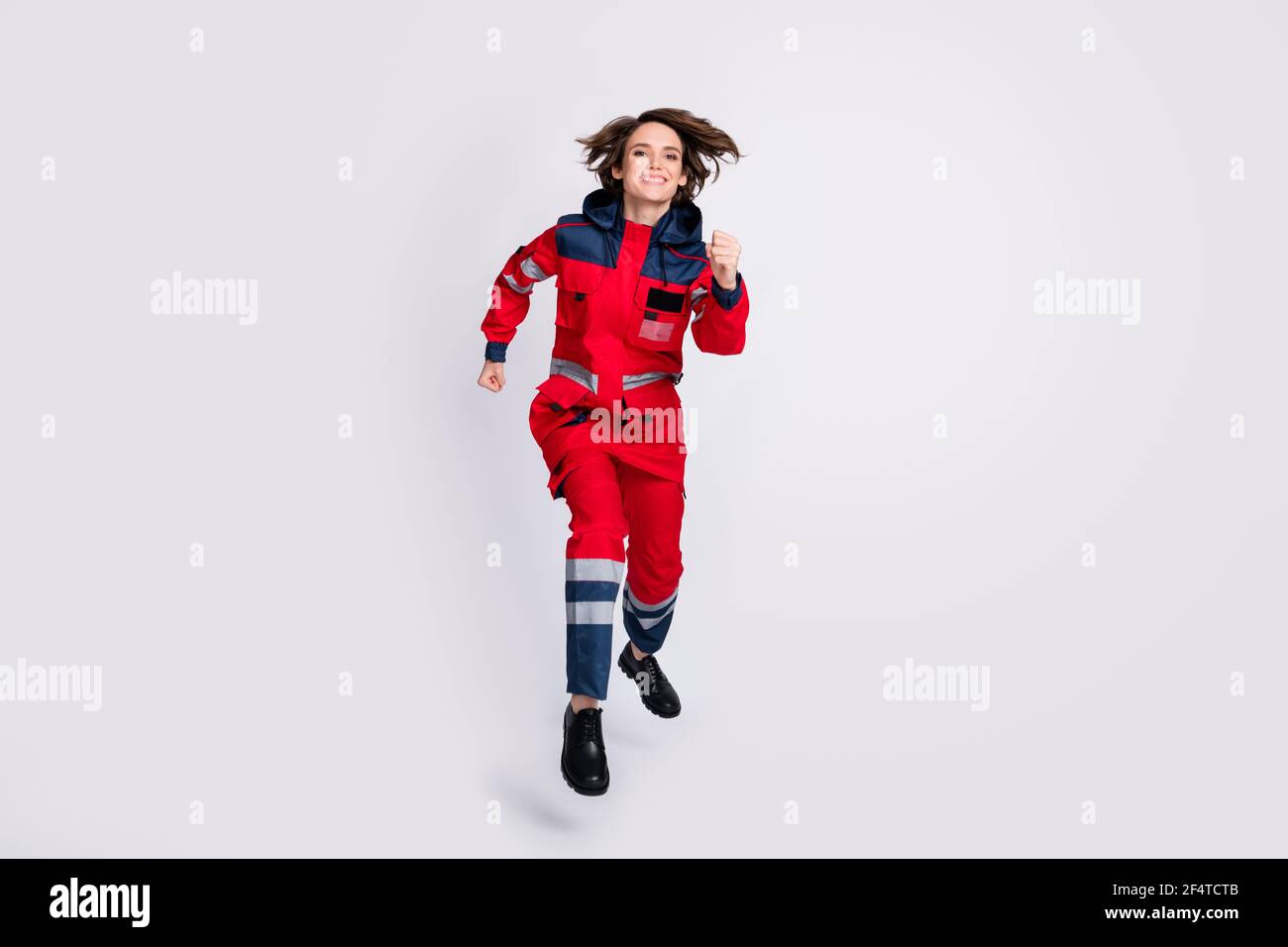 Full size photo of happy smiling positive girl paramedic running fast ...