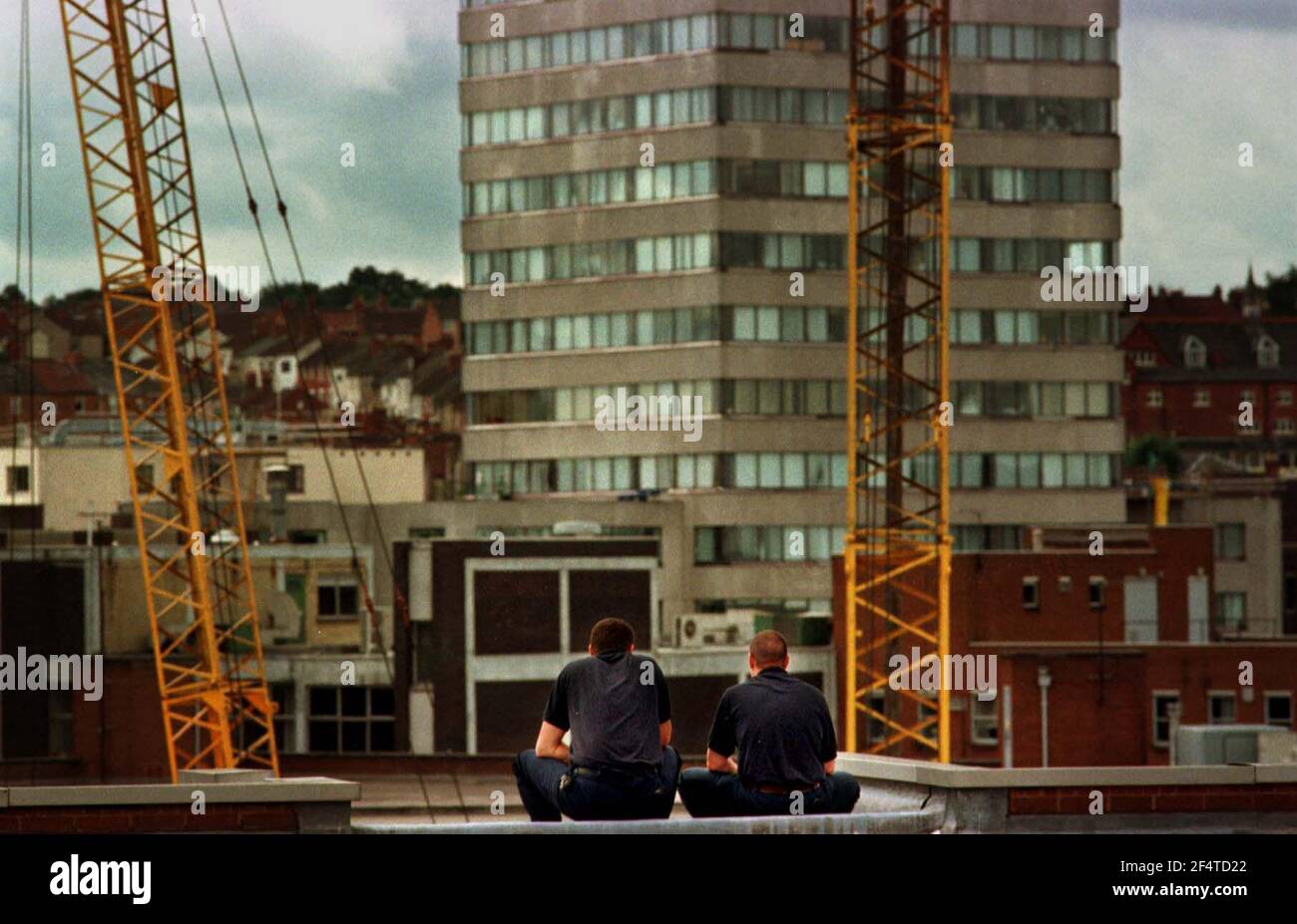 Two men on roof hi-res stock photography and images - Alamy