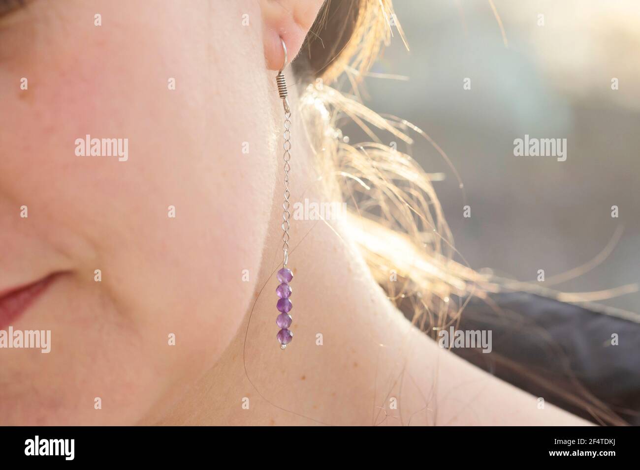 Ear jewel hi-res stock photography and images - Alamy