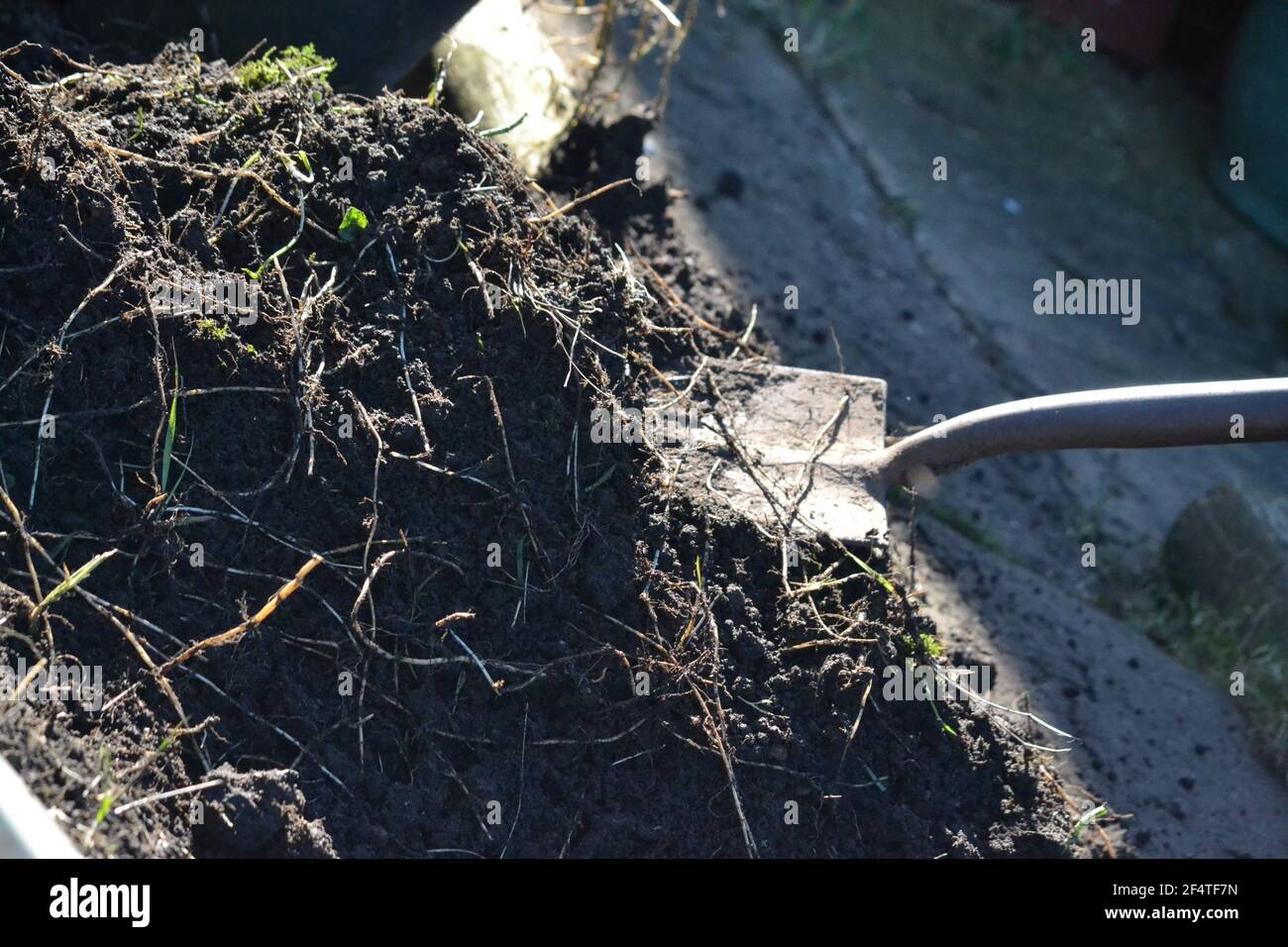 Pile Of Mud And Roots With A Garden Spade - Garden And Allotments ...