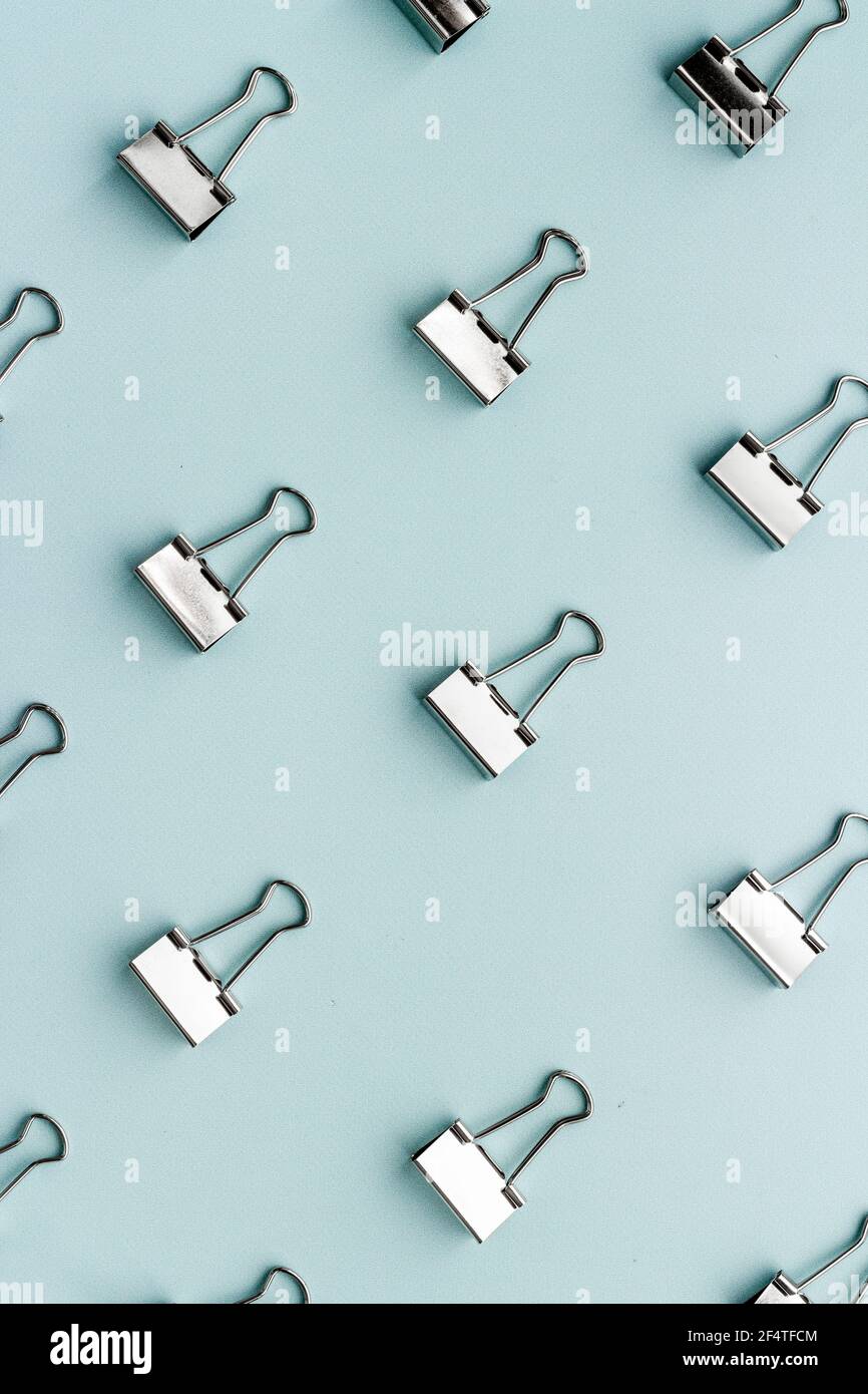 Paper binder clips pattern, copy space. Office supplies background ...