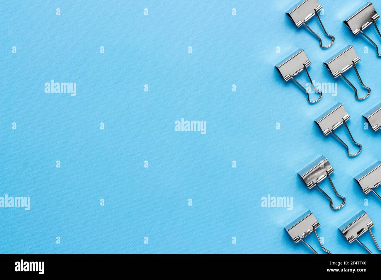 Stationery pattern, office supplies background. Paper binder clips top ...