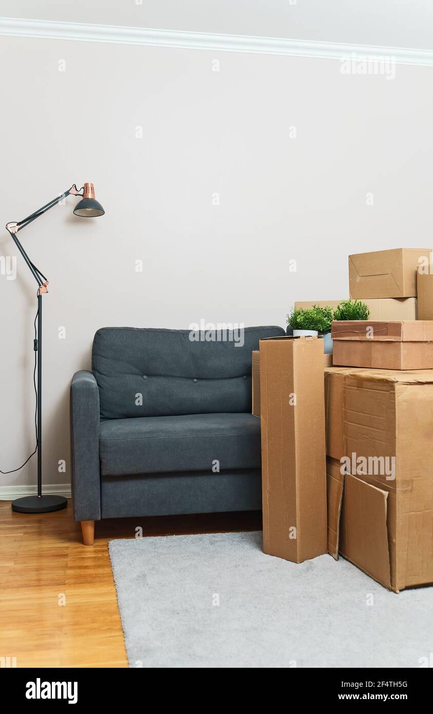Cardboard boxes in room. Real estate and moving concept Stock Photo - Alamy