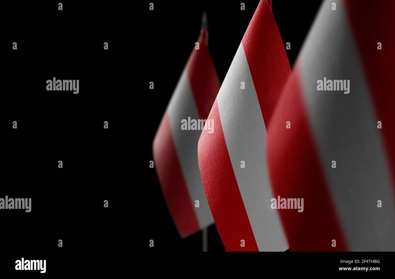 Small national flags of the Austria on a black background Stock Photo ...