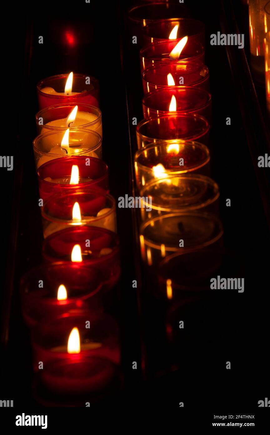 Candles in church. Celebration light background. Victim soul memorial ...