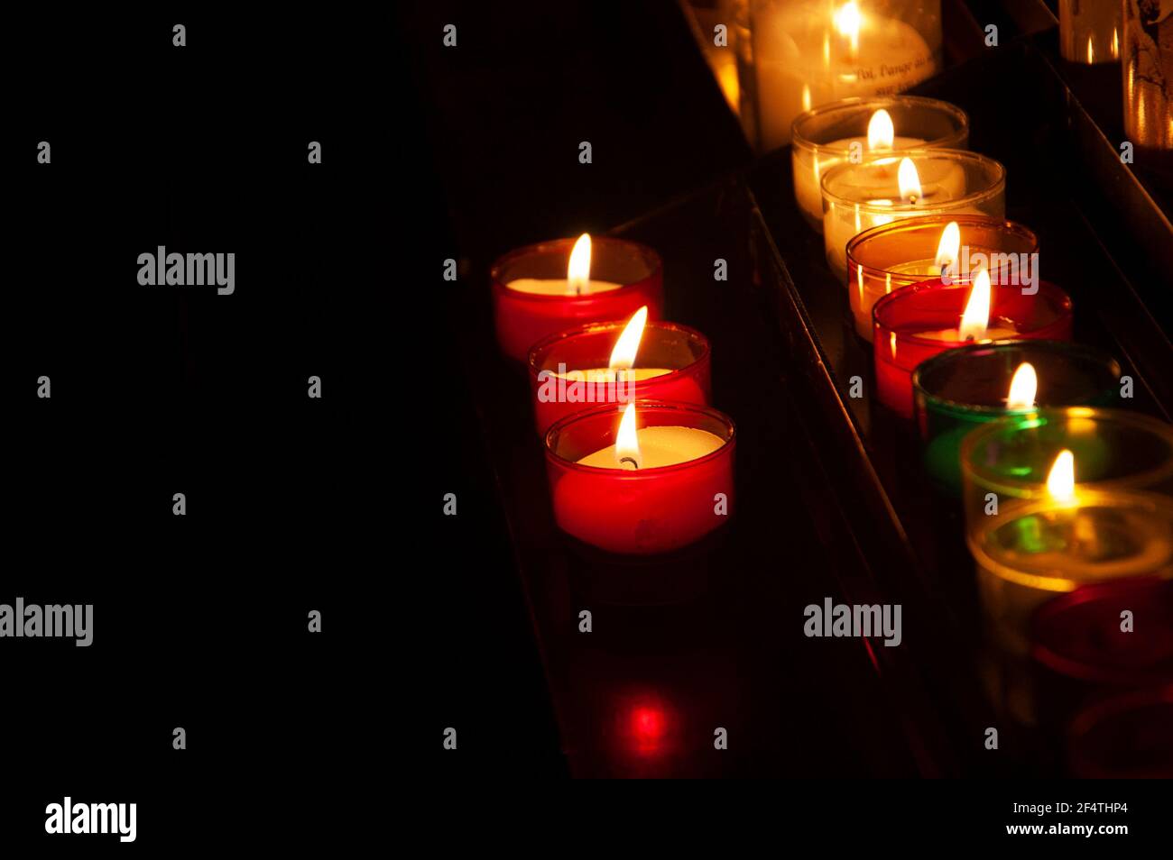 Candles in church. Celebration light background. Victim soul memorial ...