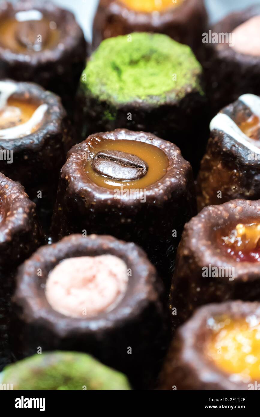 Caneles de bordeaux is a small pastry with rum and vanilla, traditional ...