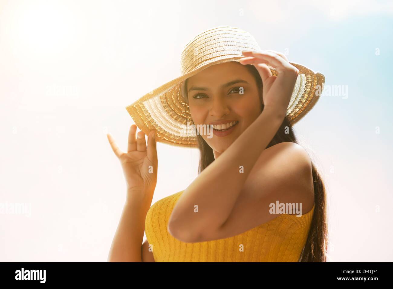 Posing with hat hi-res stock photography and images - Alamy