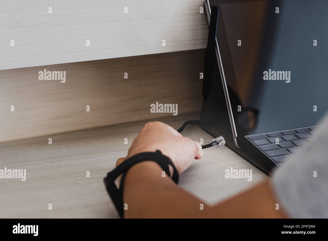 Lan cable port hand hi-res stock photography and images - Alamy