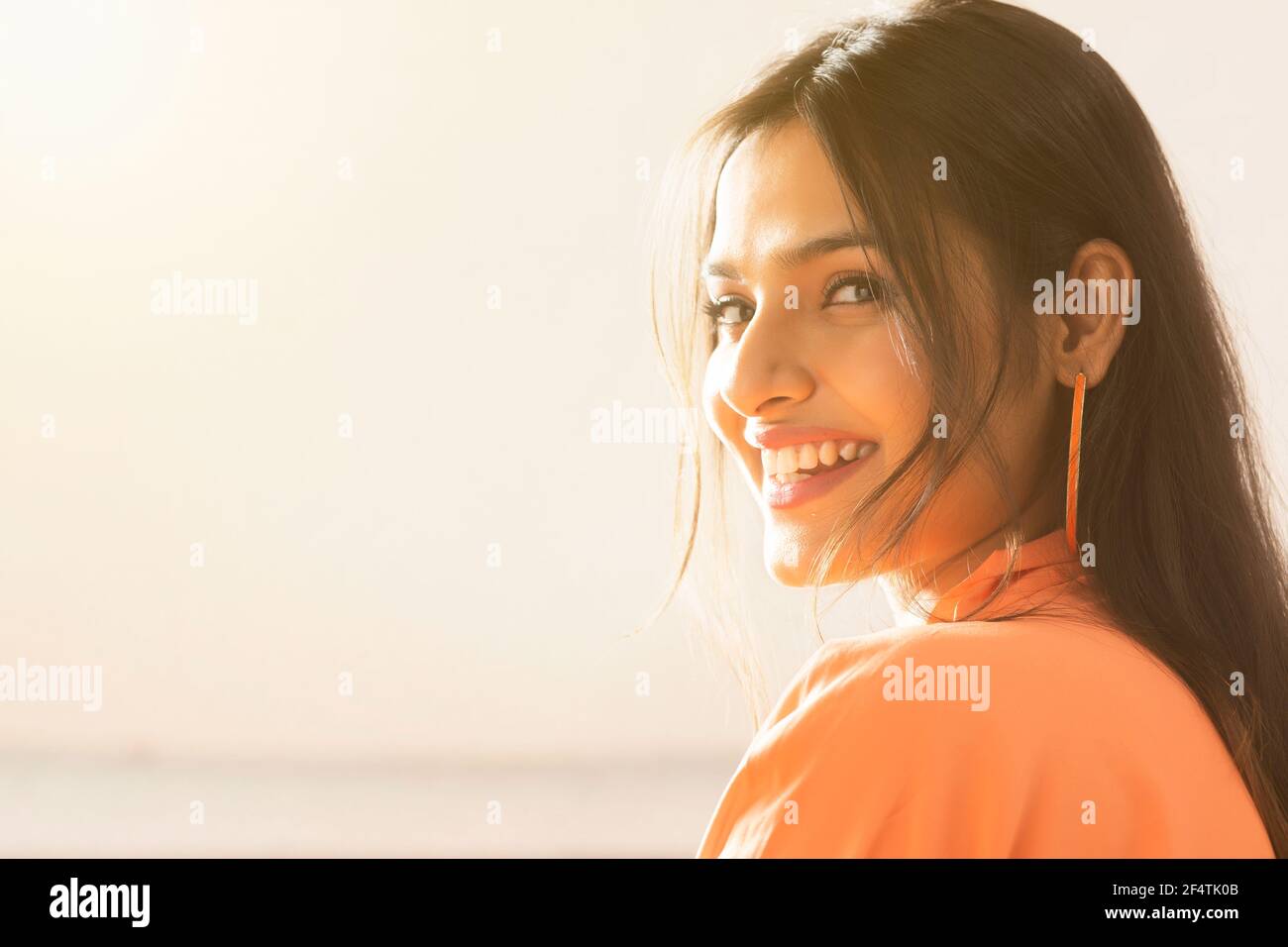 Female turning around hi-res stock photography and images - Alamy
