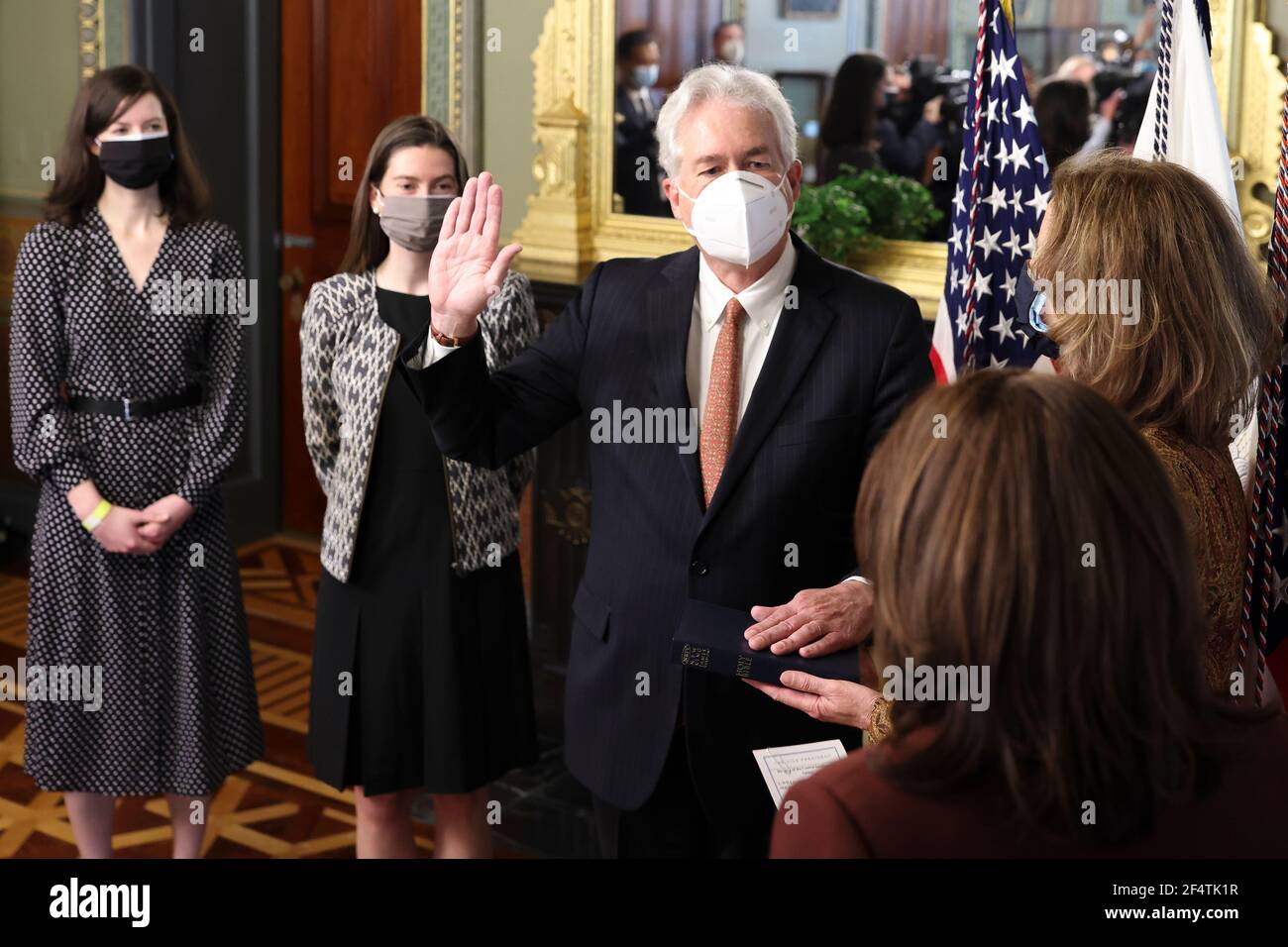 Vice President Kamala Harris, right swears-in William J. Burns, center ...