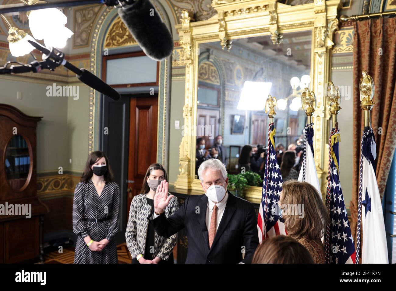 Washington, USA. 23rd Mar, 2021. Vice President Kamala Harris, right ...