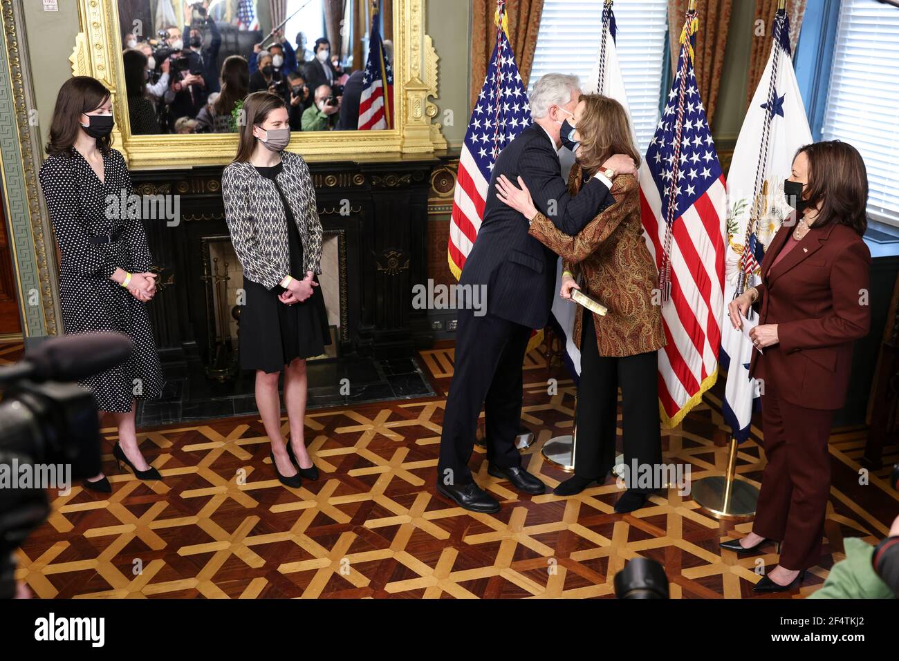 Washington, USA. 23rd Mar, 2021. Vice President Kamala Harris, right ...