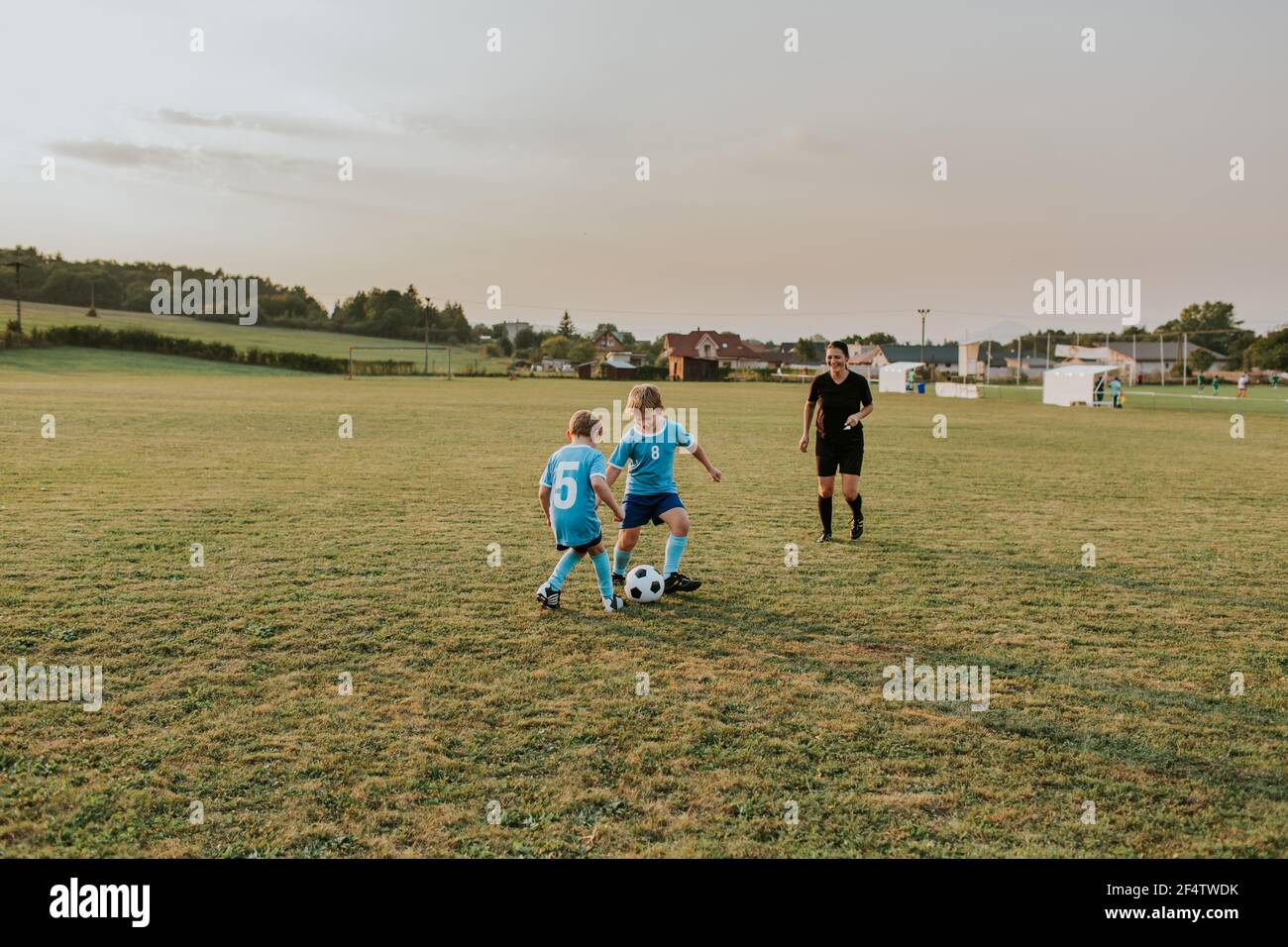 Two boys playing football hi-res stock photography and images - Alamy