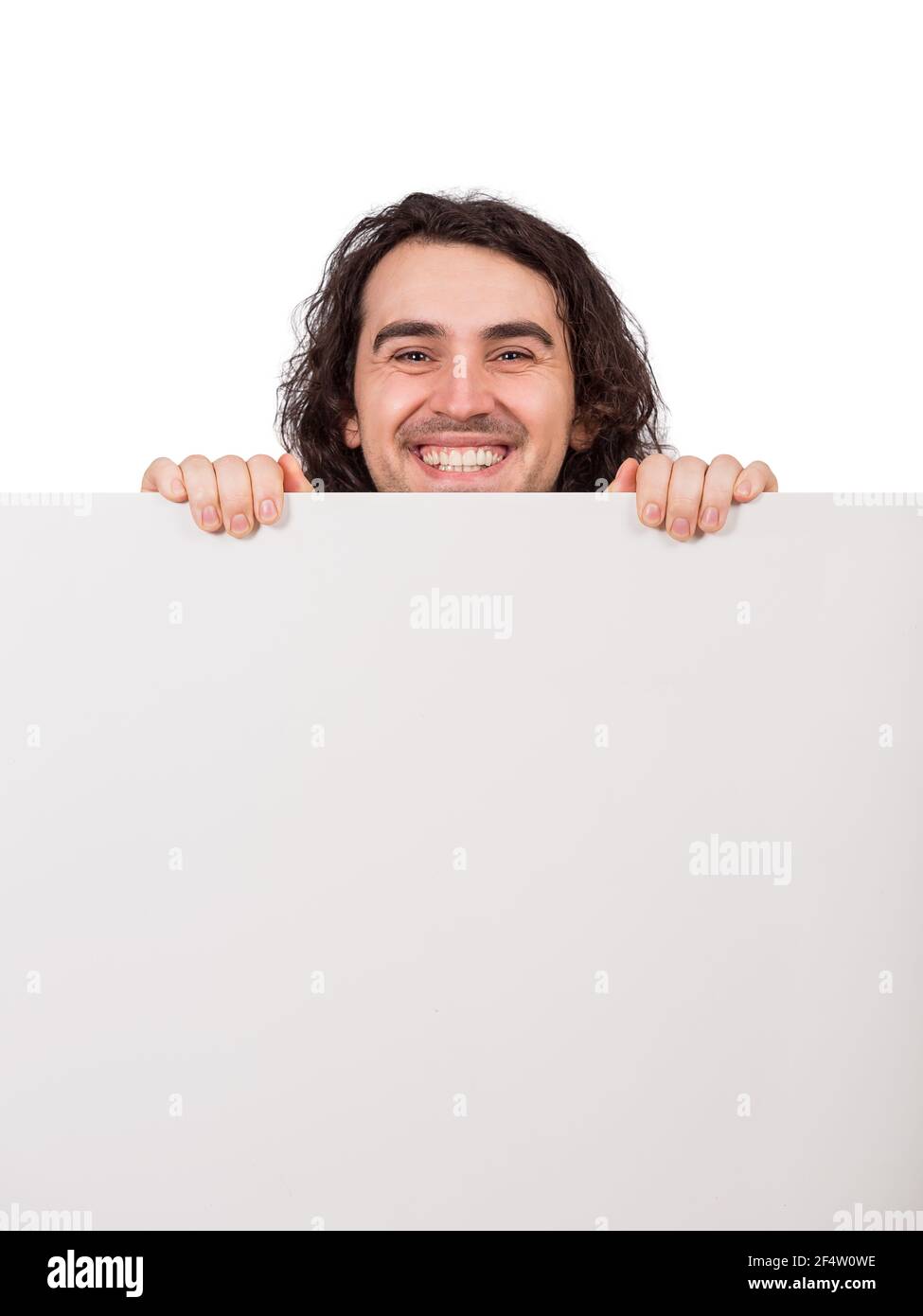 Closeup portrait, smiling man standing behind a blank banner for ...