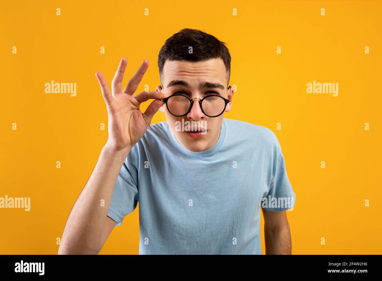 Suspicious eyes hi-res stock photography and images - Alamy