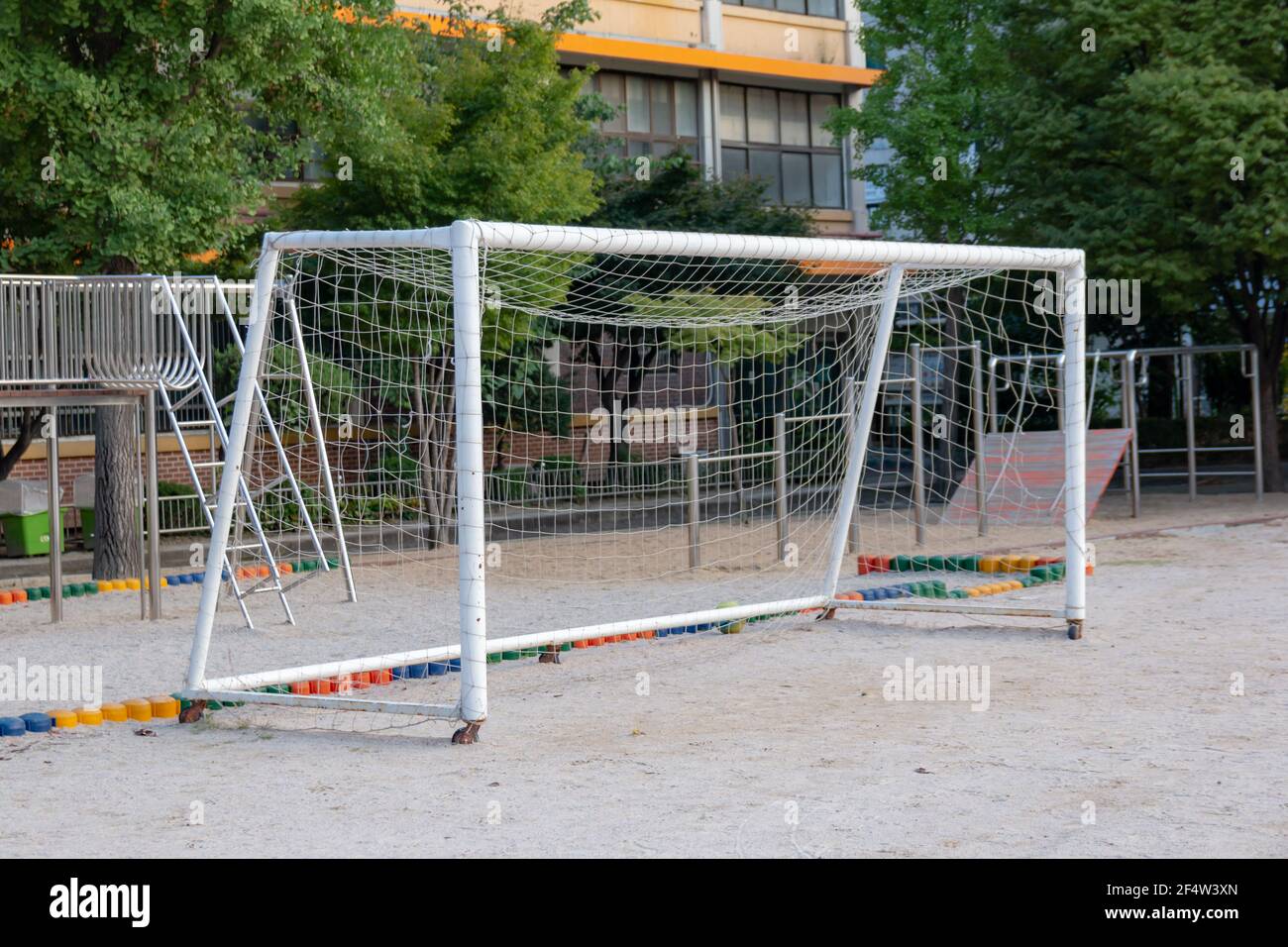 white football goal post on the play ground of Korean elementary school ...
