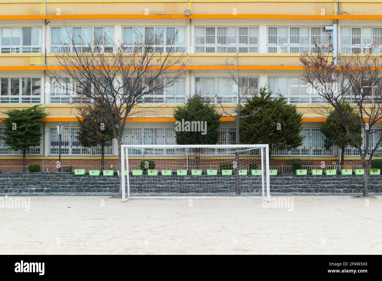 white football goal post on the play ground of Korean elementary school ...