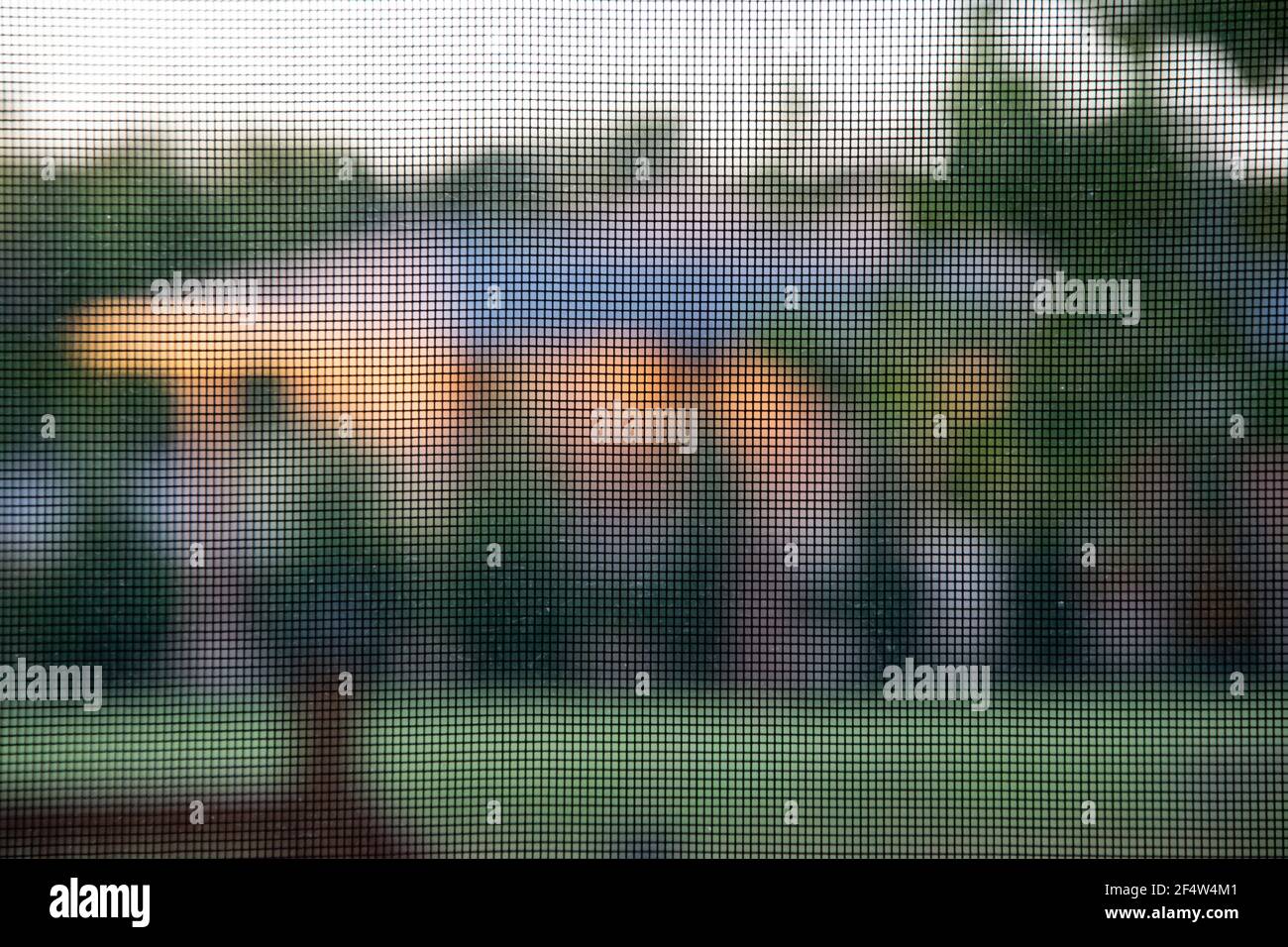 Patterned black net on the window for bugs Stock Photo - Alamy