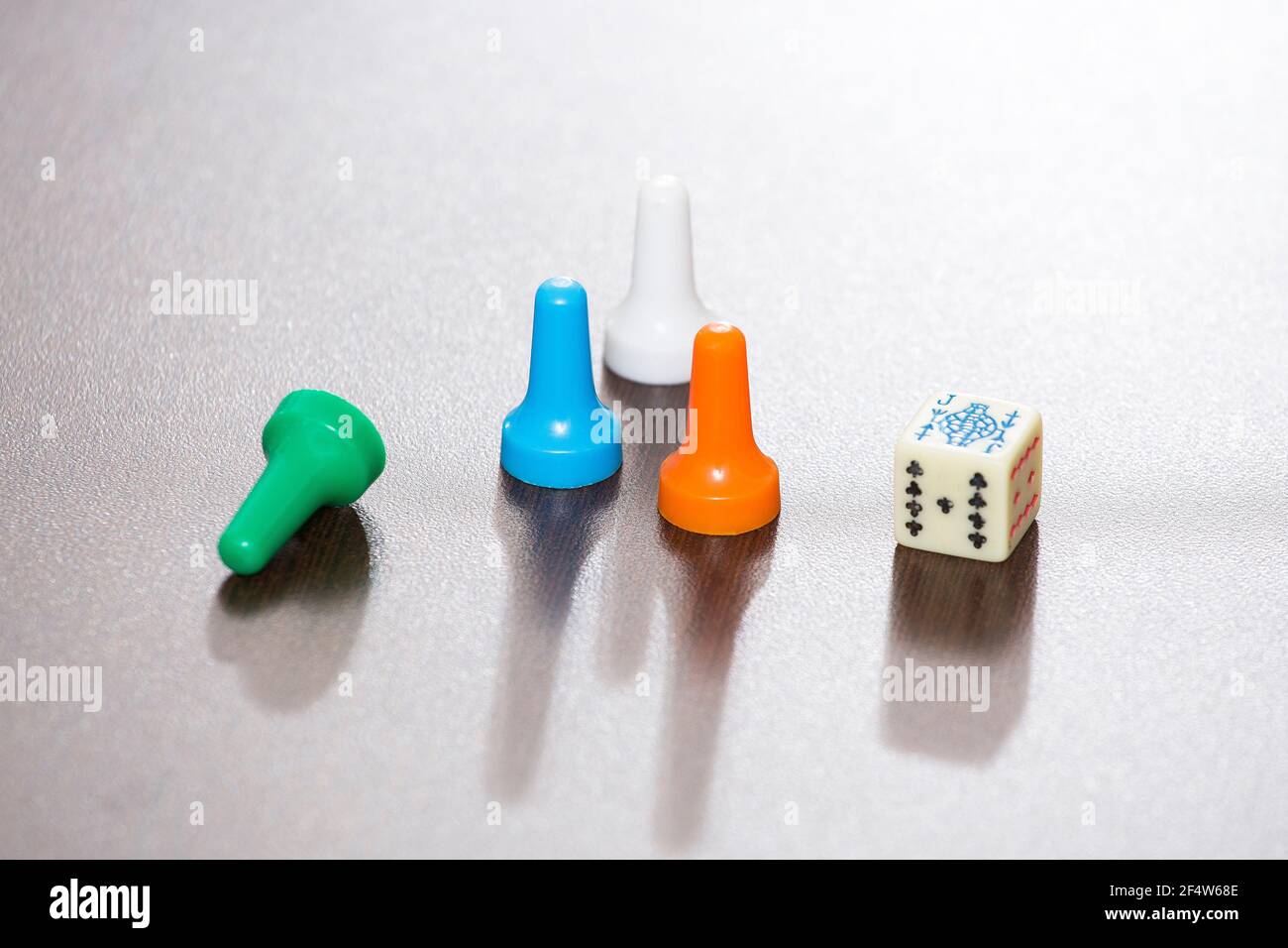 game pieces with dice isolated Stock Photo - Alamy